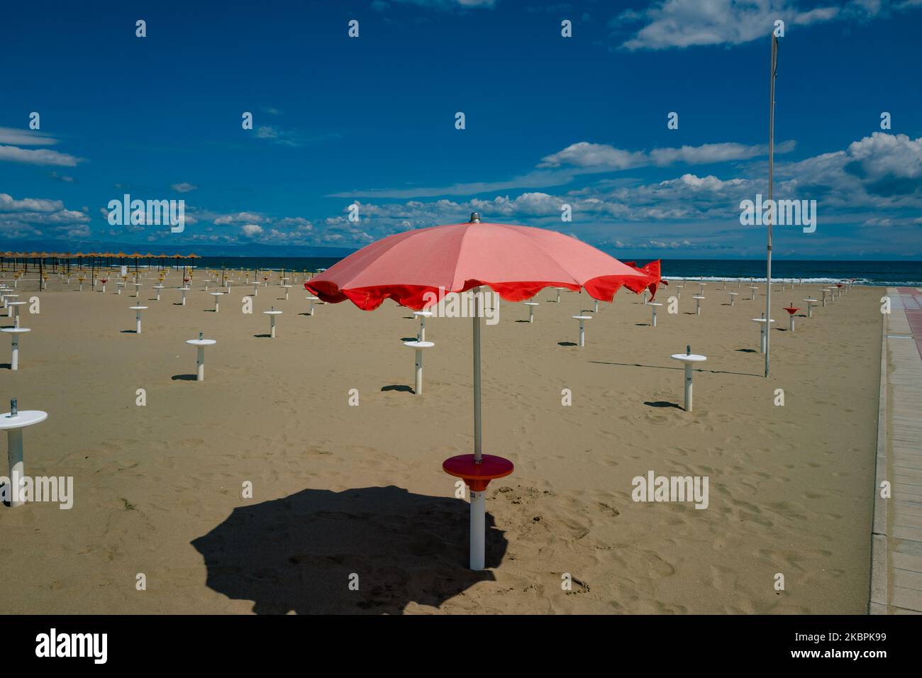 Margherita di Savoia beach near Barletta with the first umbrella ...