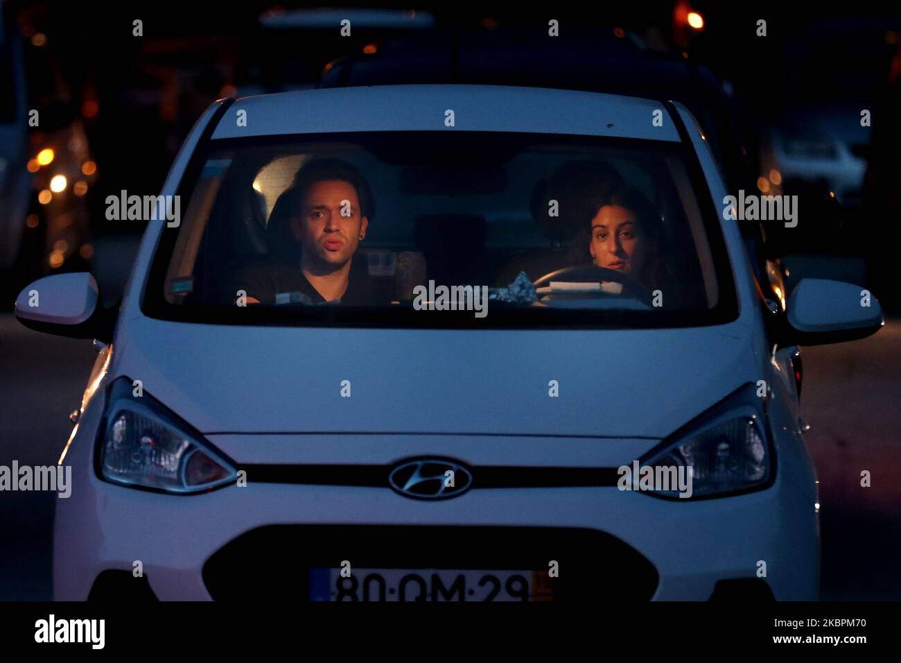 Spectators in their cars watch the movie "Once Upon a Time... in ...