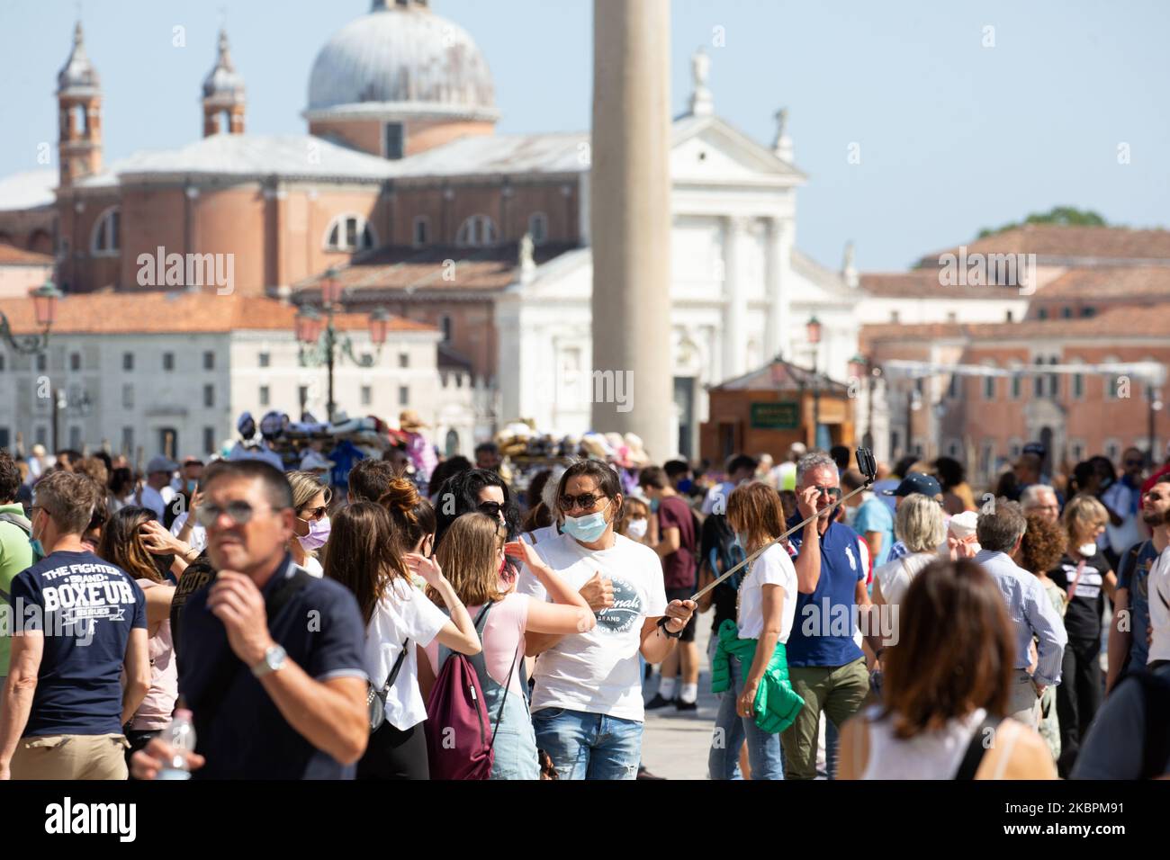 People walk in Venice, Italy, on June 2, 2020 during the Italian ...