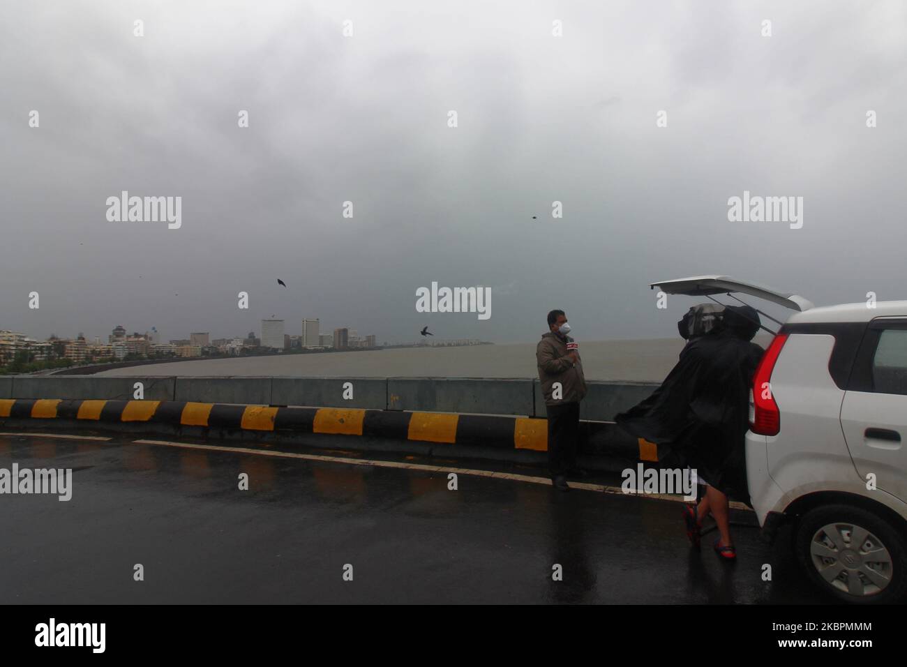 Weather reporter wind rain hi-res stock photography and images - Alamy