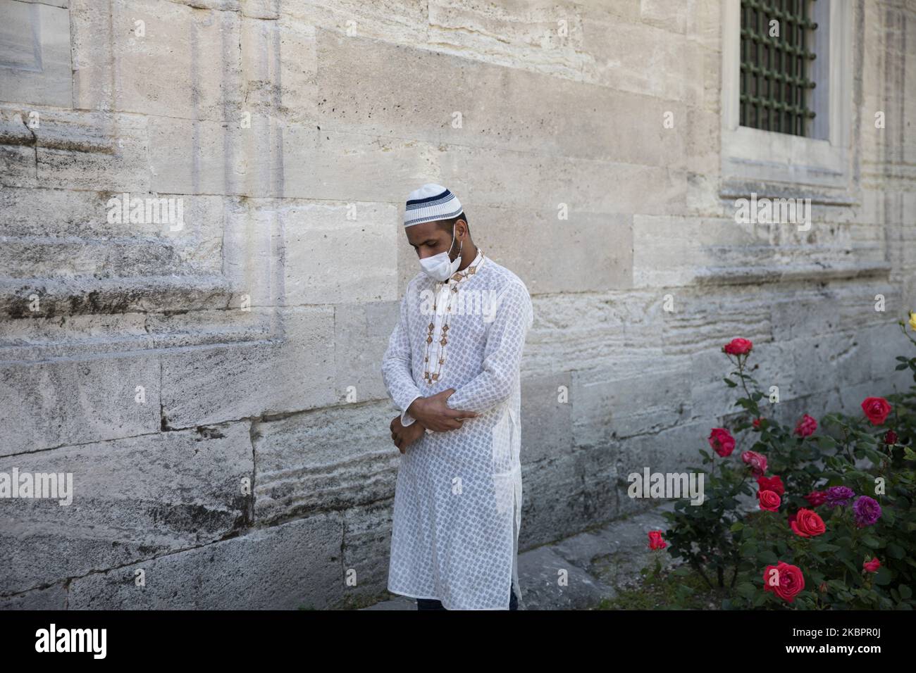 Muslims keeping their social distance, perform Friday prayer at ...
