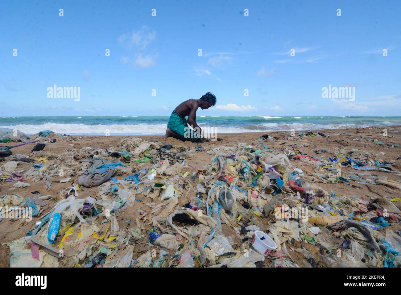 Provincial workers took part in a beach clean-up attempt to remove ...