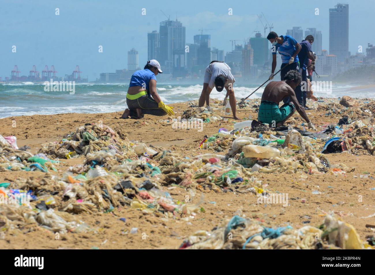 Provincial workers took part in a beach clean-up attempt to remove ...