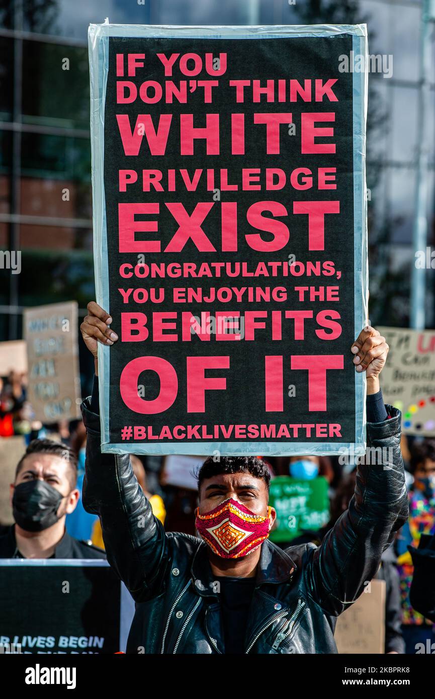 Big anti racist placard hi-res stock photography and images - Alamy