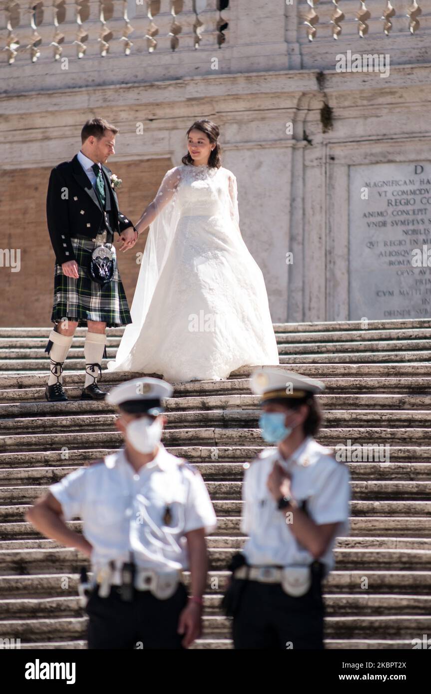 The bridegroom wears a kilt, the traditional Scottish dress, as a ...