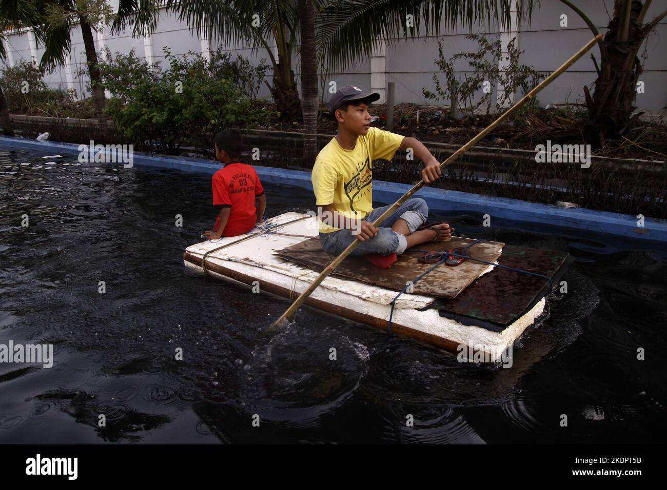 Residents do their activities using the handmade raft to crossing the ...