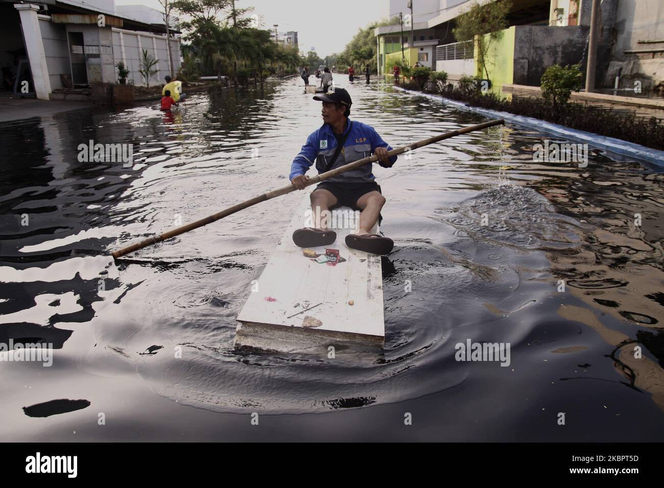 Residents do their activities using the handmade raft to crossing the ...