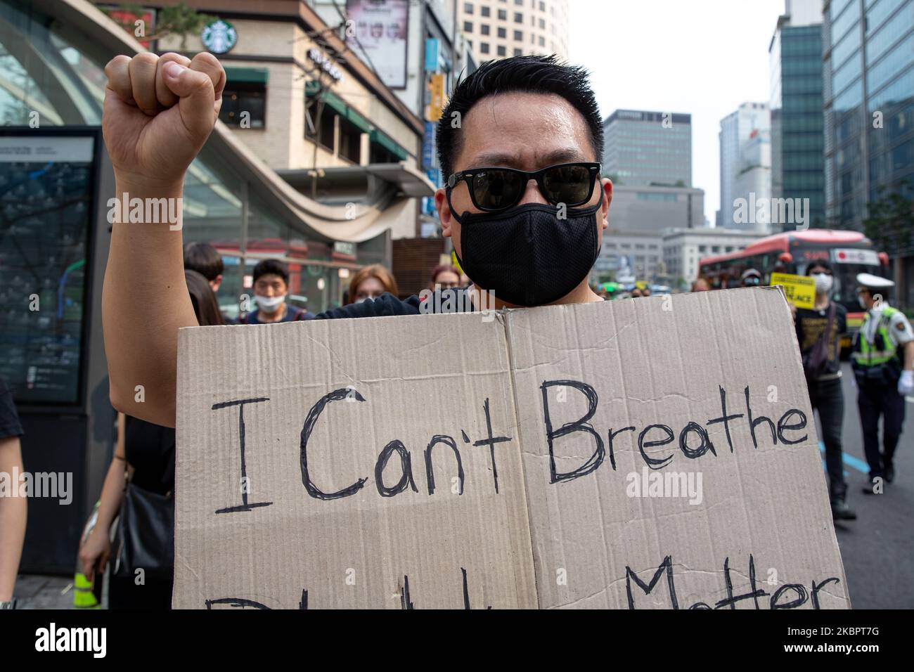 Protestor holds a Black Lives Matter placard on June 06, 2020 in Seoul ...