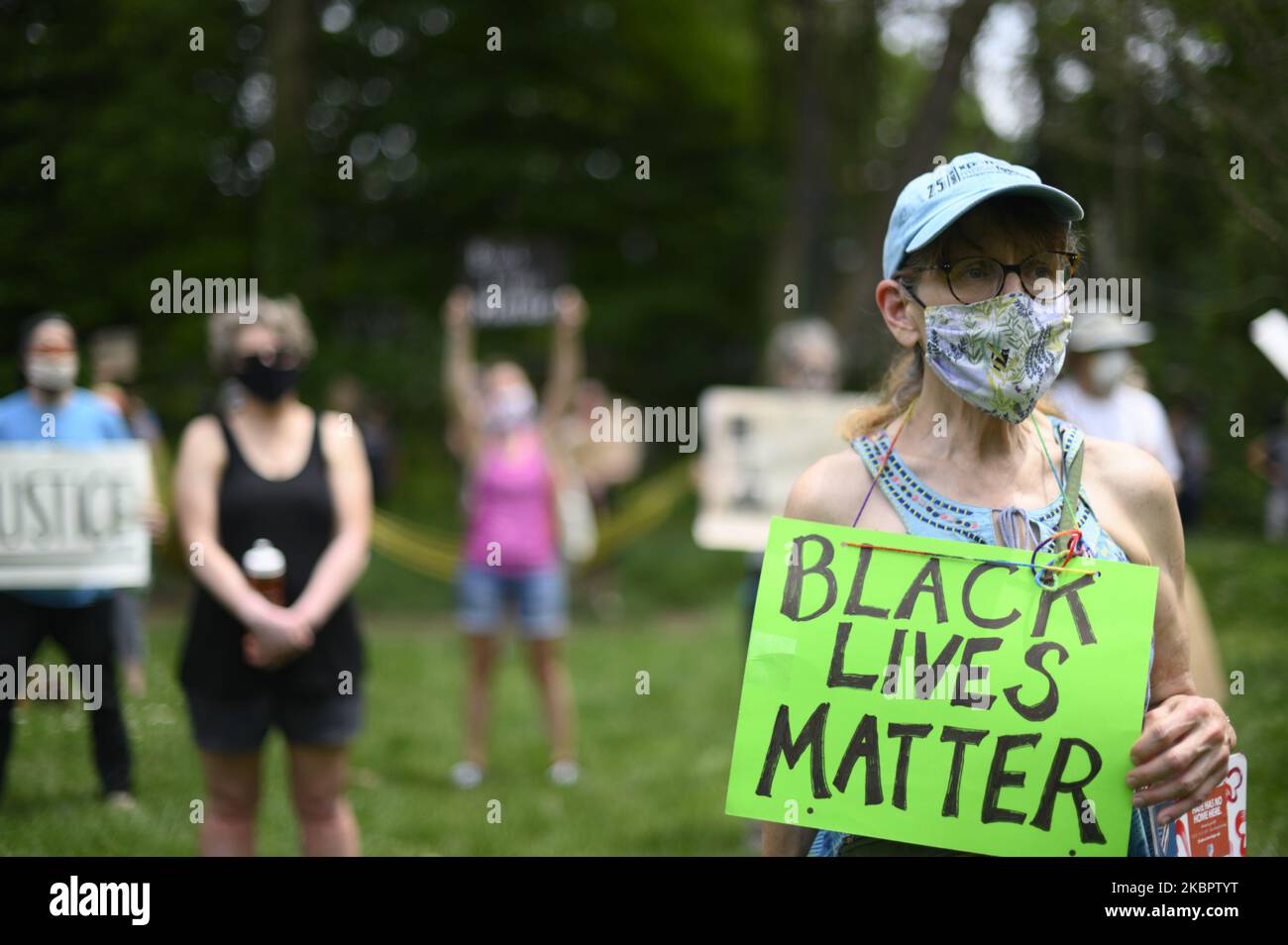 Community members gather for a family-friendly and peaceful protest in ...