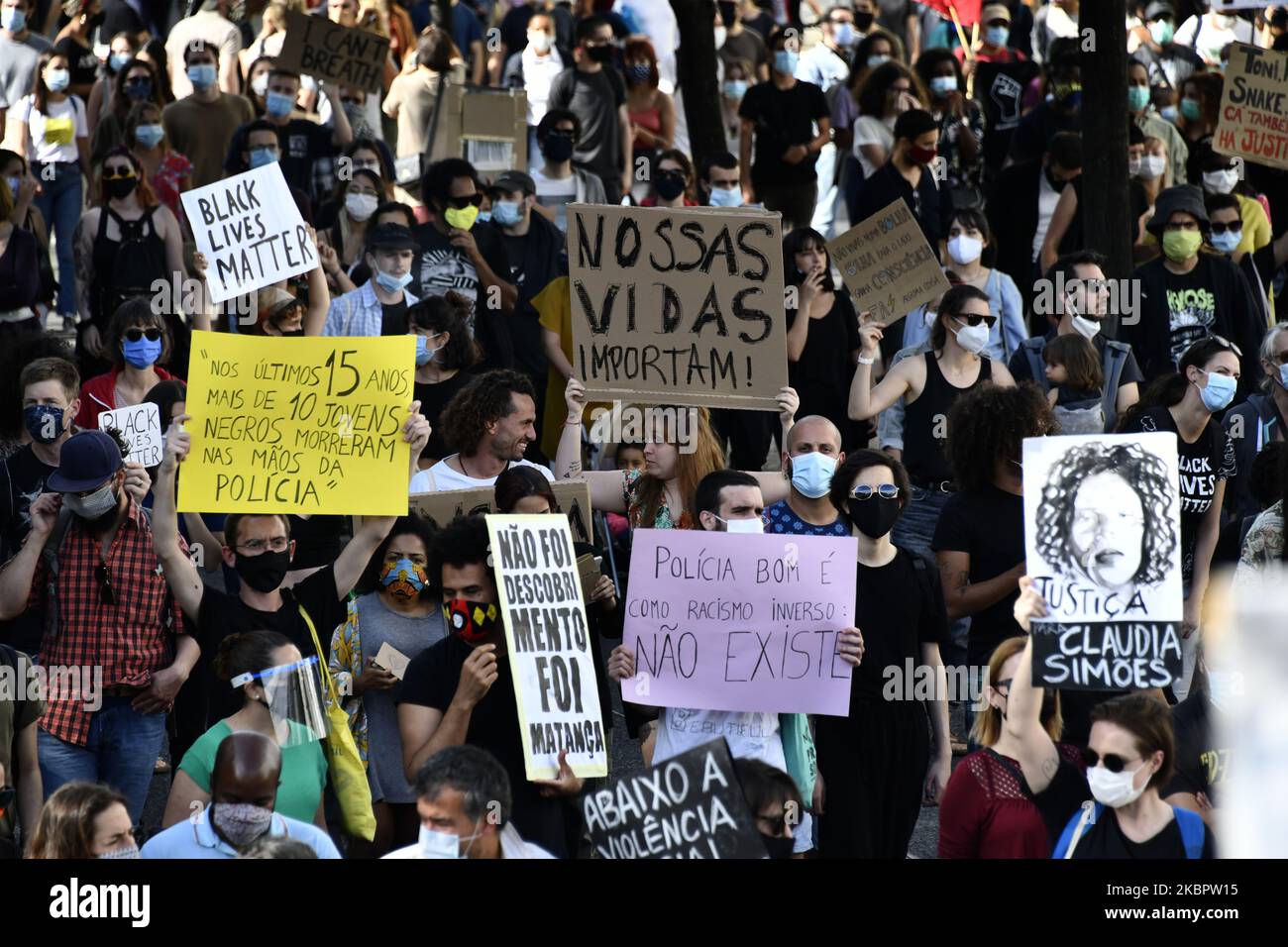 Large numbers of people marched down Lisbon's main avenues to reject ...