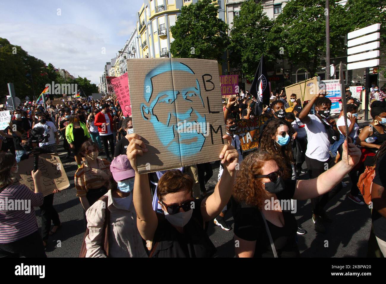 Large numbers of people marched down Lisbon's main avenues to reject ...