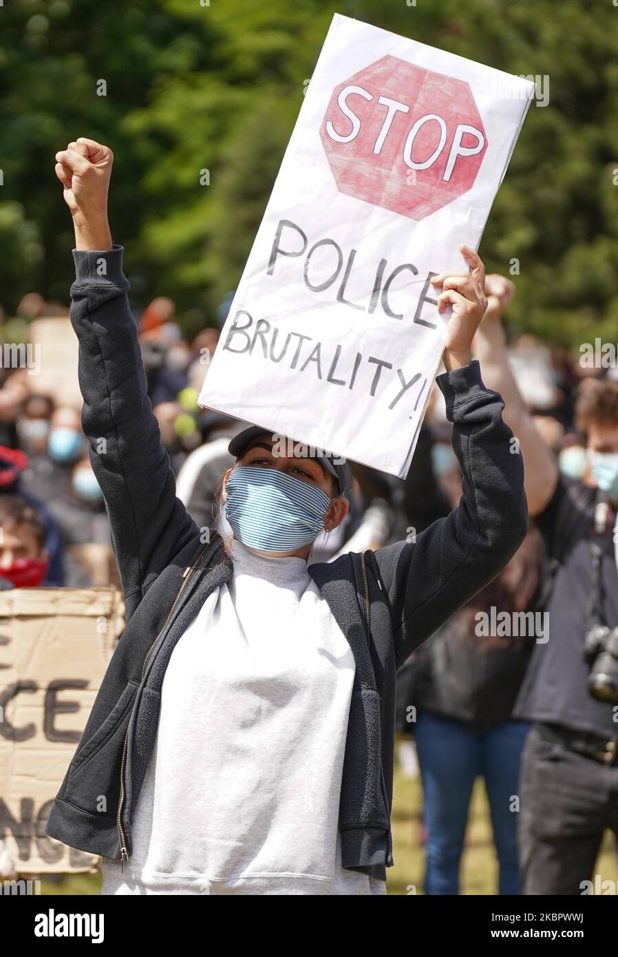 People holding placards as they attend at the Black Lives Matter ...