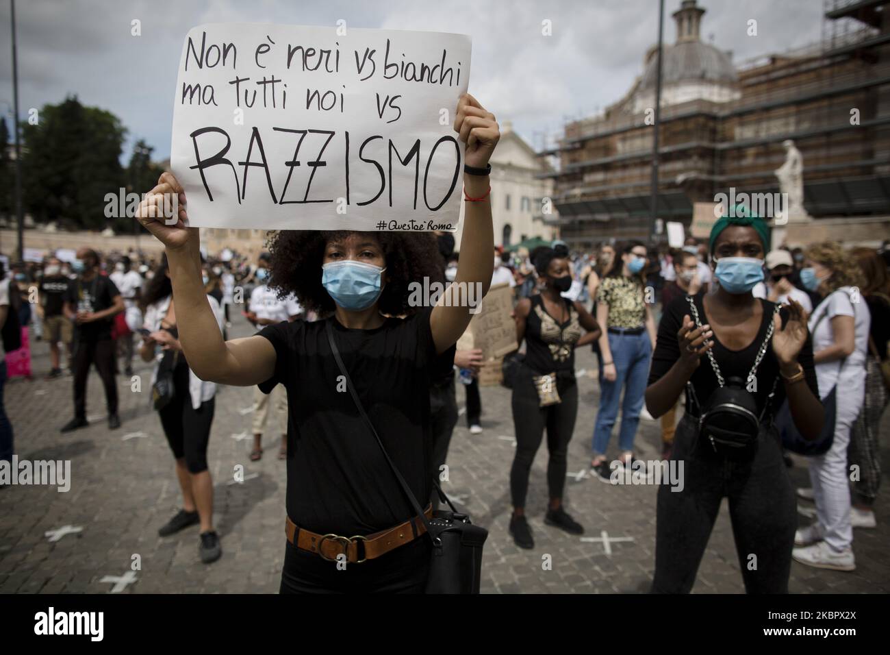 People take part in an action in Rome's Piazza del Popolo square on ...