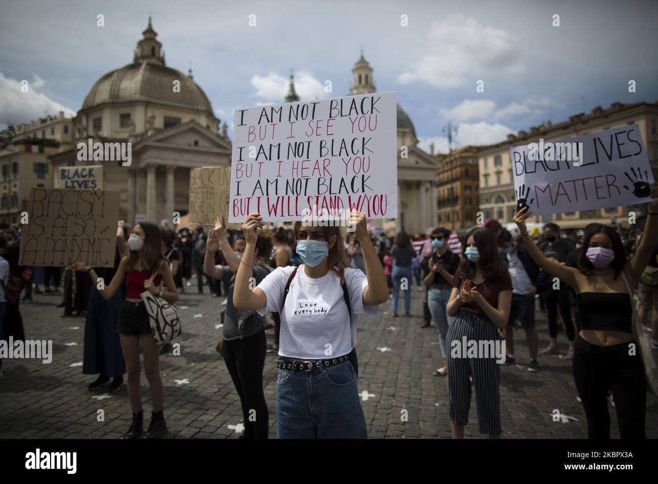 People take part in an action in Rome's Piazza del Popolo square on ...