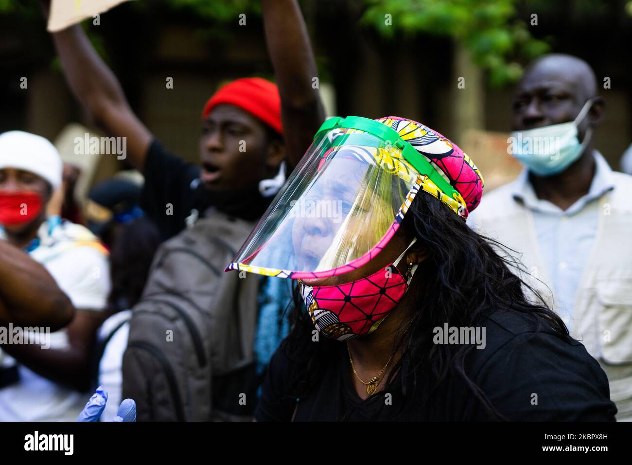 A woman grotto slogans during Black Lives Matter protest in Plaza del ...