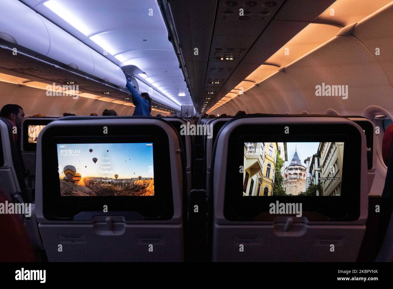IFE In flight entertainment screen in economy class. Flying with ...