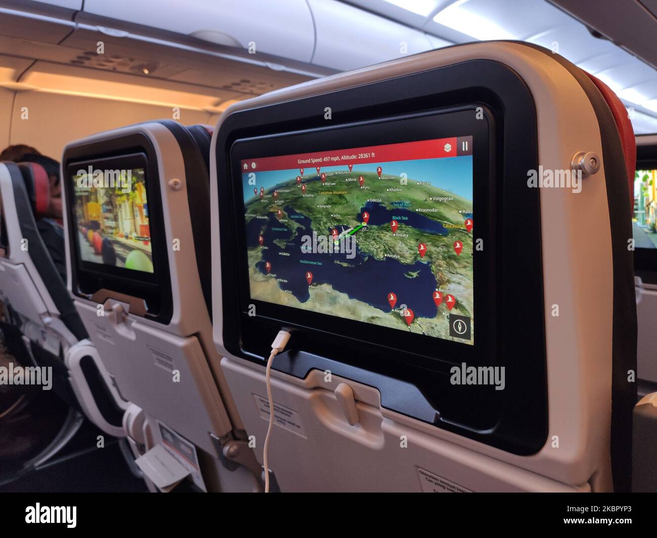 IFE In flight entertainment screen in economy class. Flying with ...
