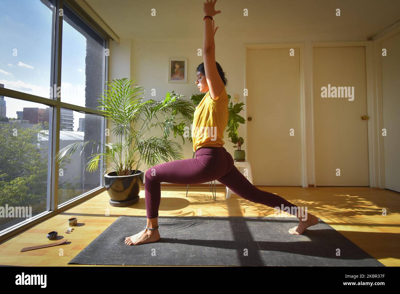 Yoga practicer and teacher Angelica Zabalza practices at home during ...