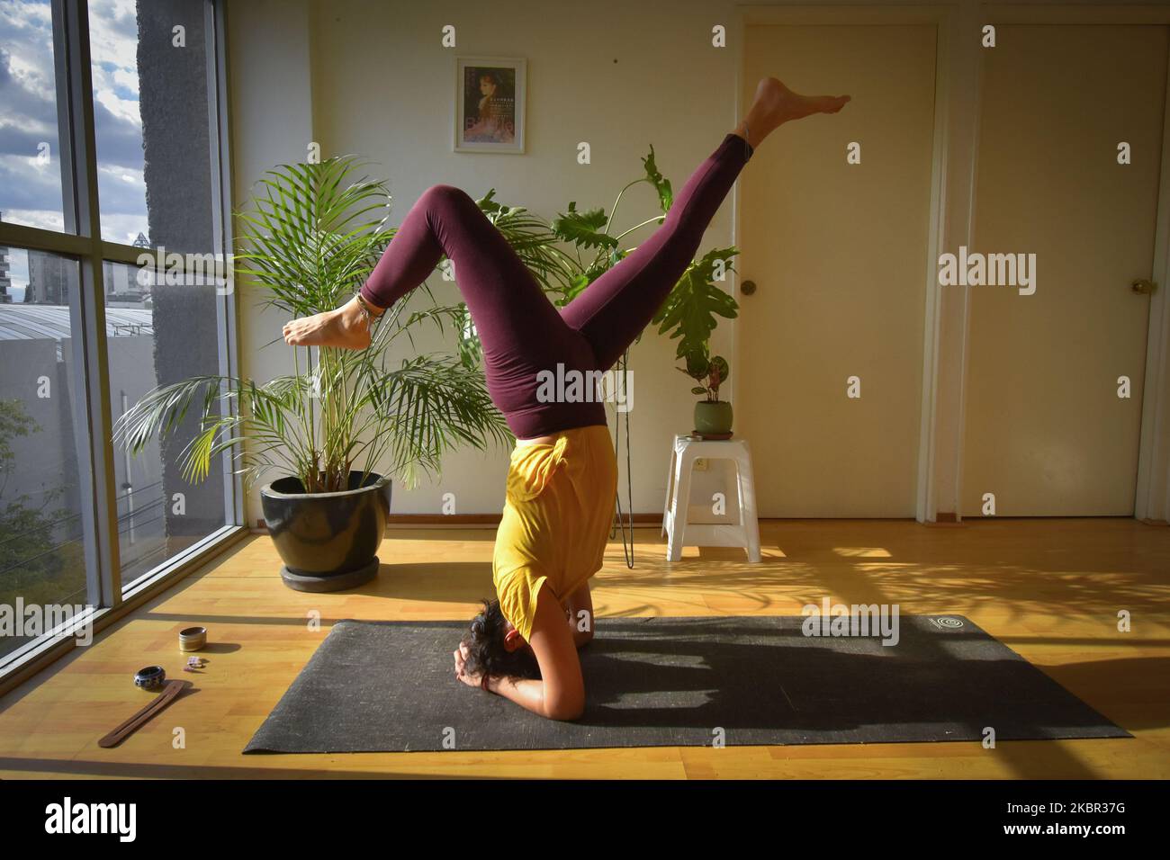 Yoga practicer and teacher Angelica Zabalza practices at home during ...
