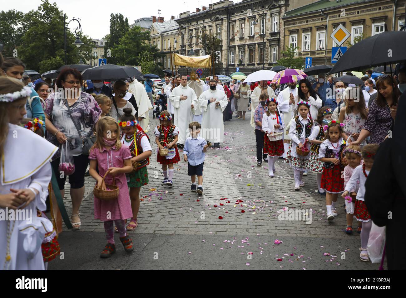 Catholics celebrate Corpus Christi by taking part in the procession ...