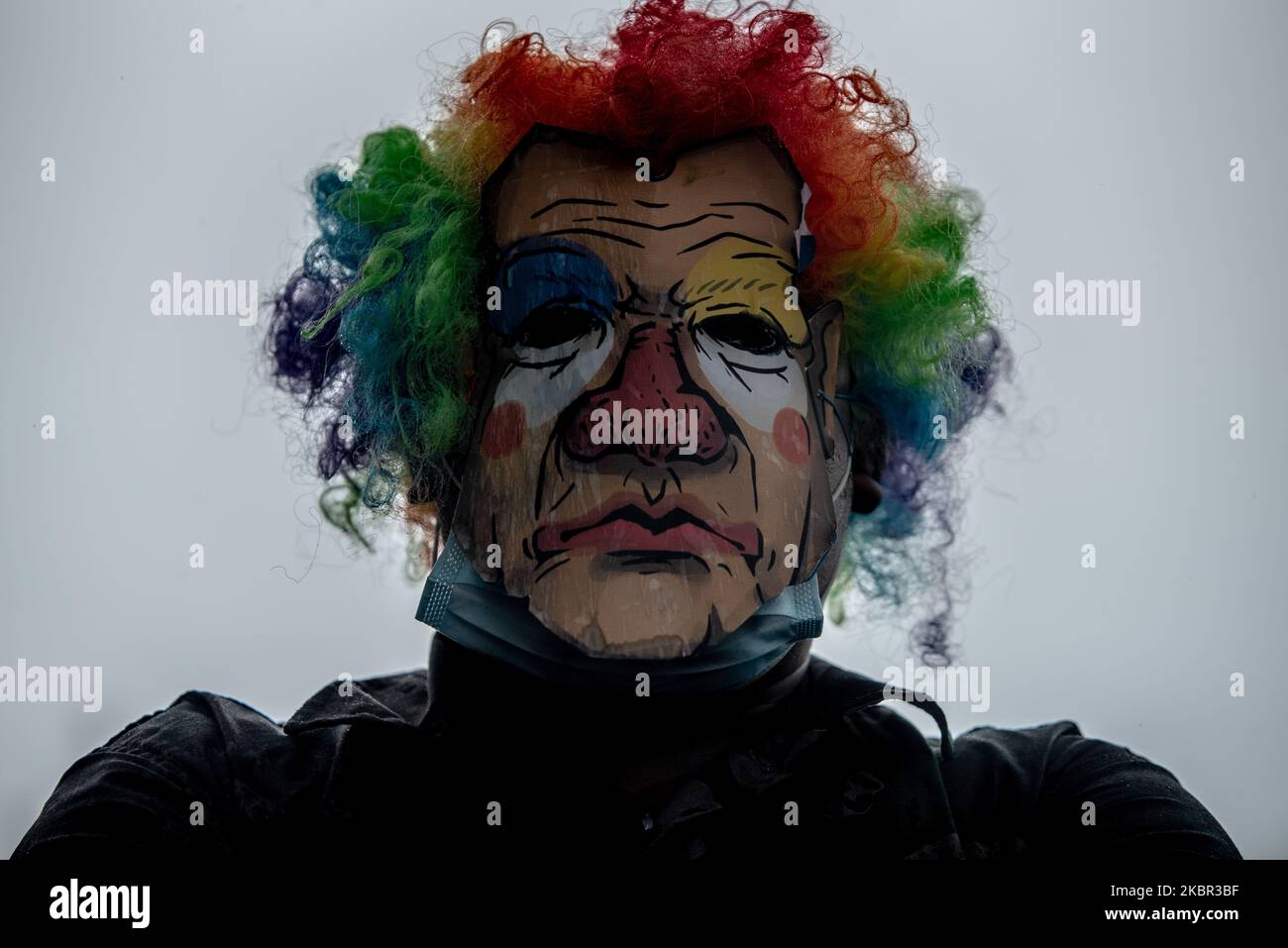 A man depicting Philippine President Rodrigo Duterte as a clown joins a ...