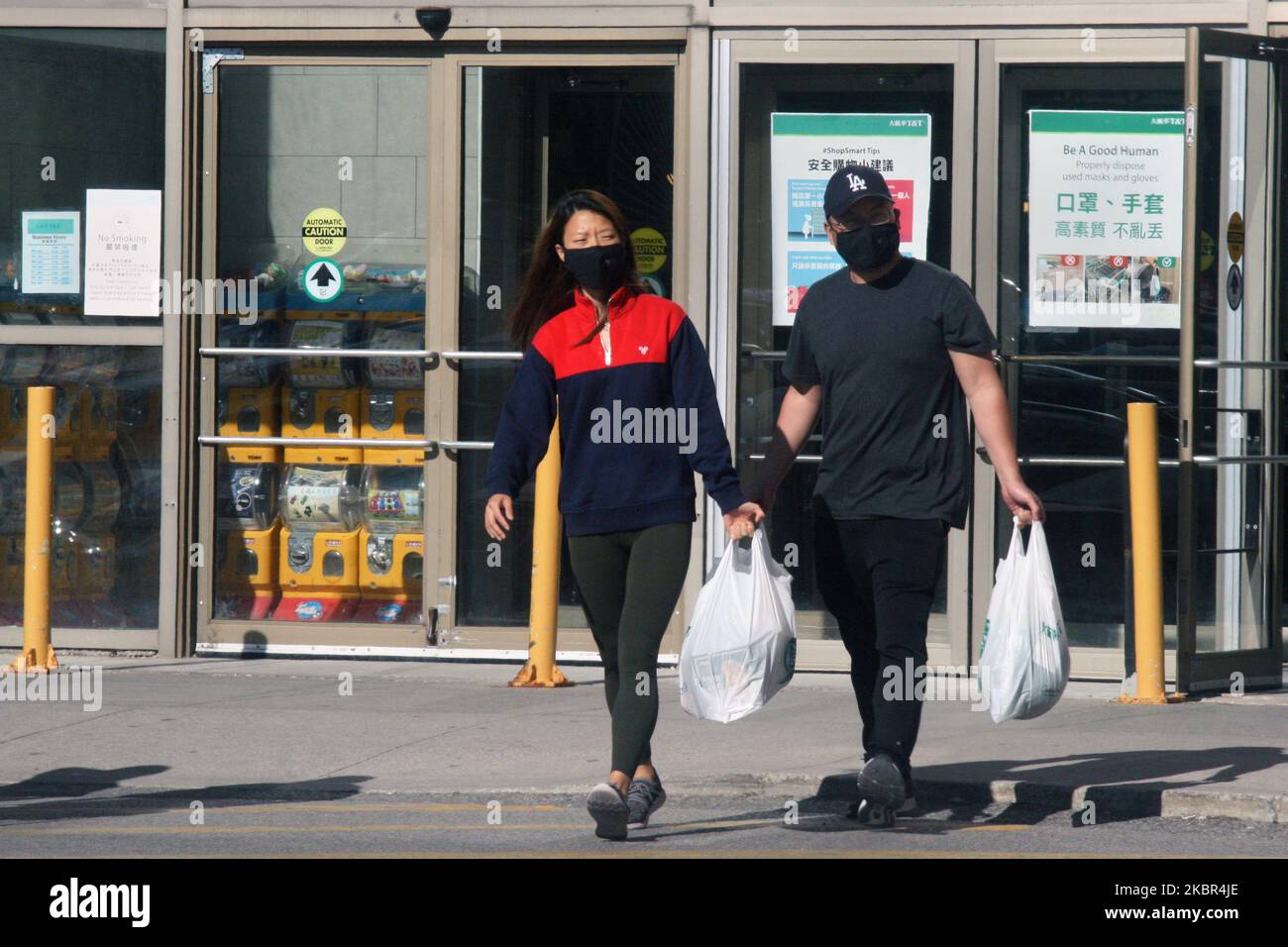People wearing face masks to protect them from the novel coronavirus ...