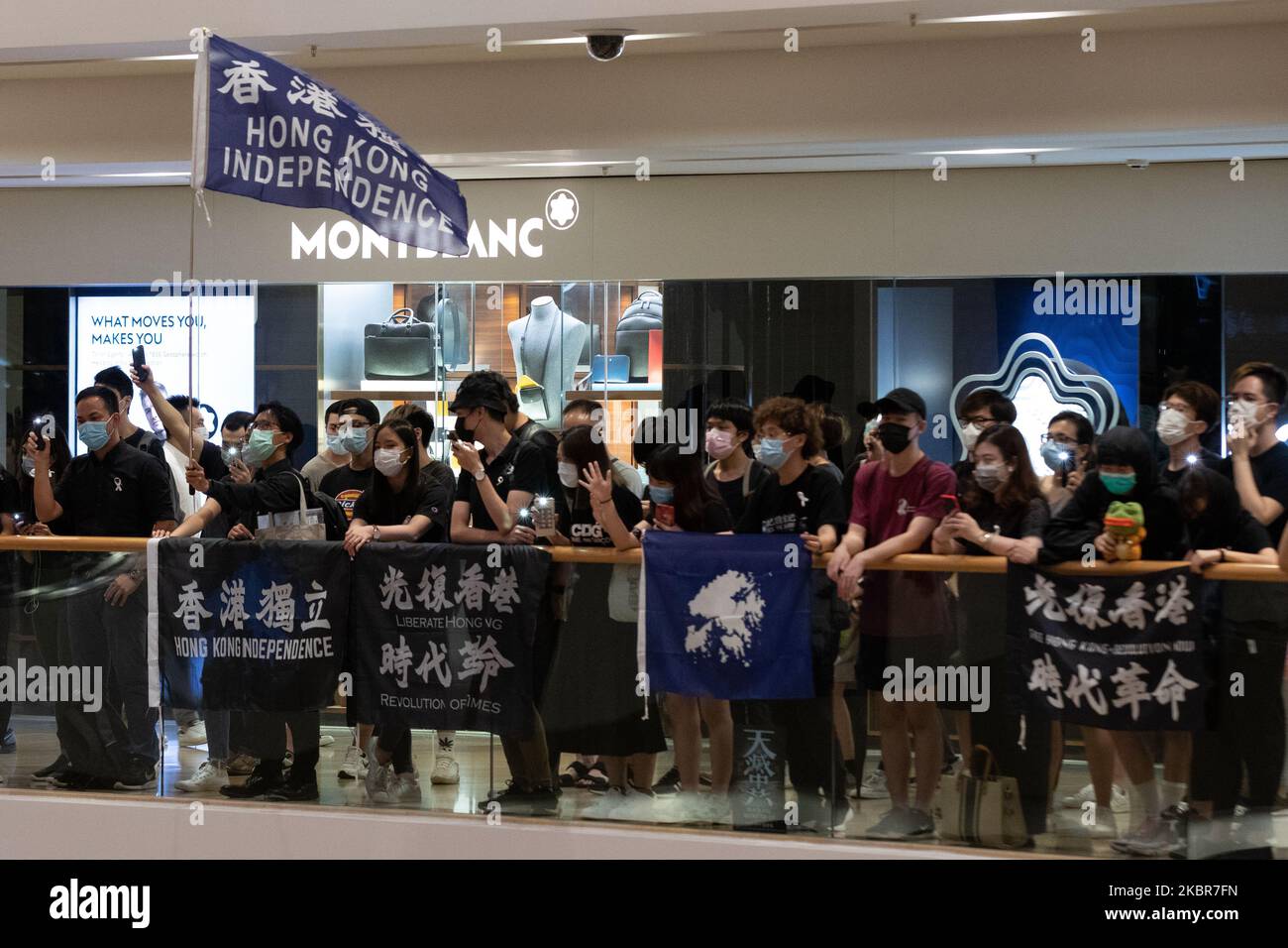 Pro Democracy supporters hold Hong Kong Independence signs and chant ...
