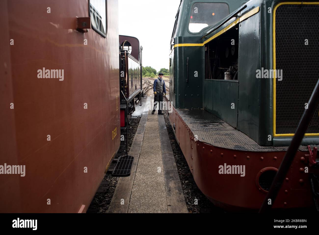 Railway workers working on the historic diesel locomotive of the Somme ...