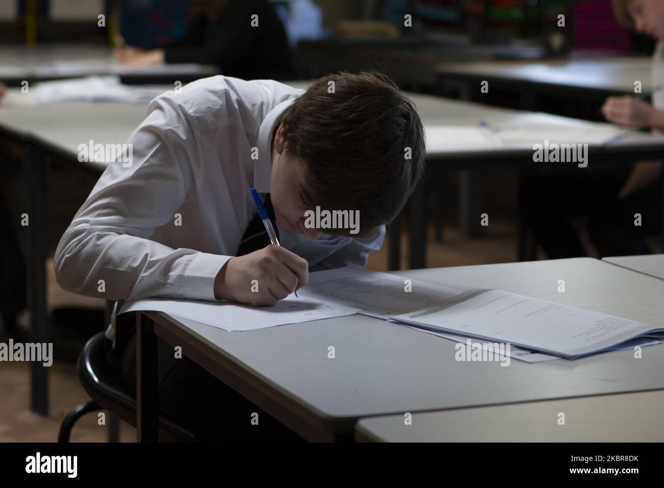 A year 10 pupil writing. Ortu Gable Hall School in Corringham, Essex ...