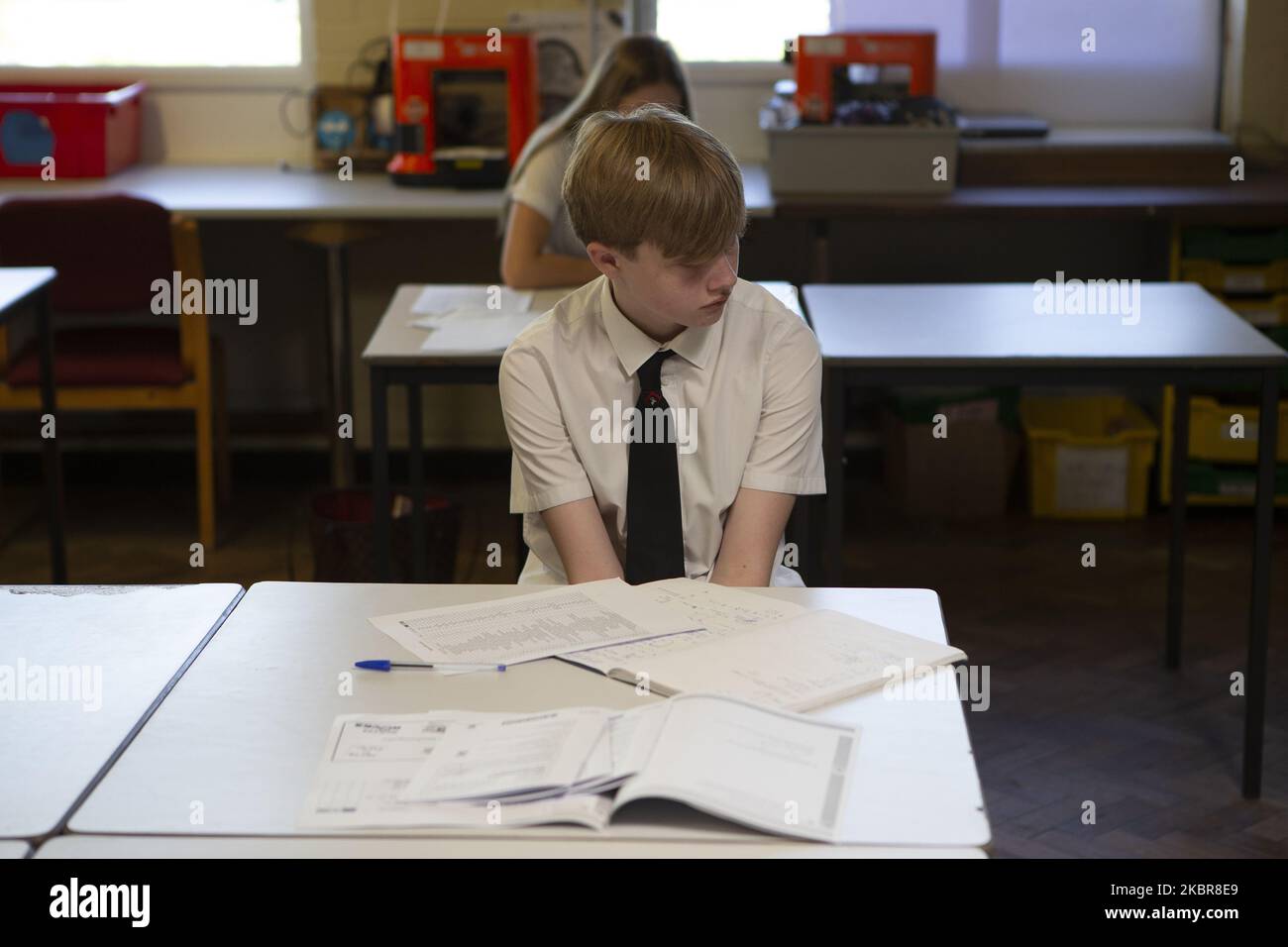 A year 10 pupil with work in front of him. Ortu Gable Hall School in ...