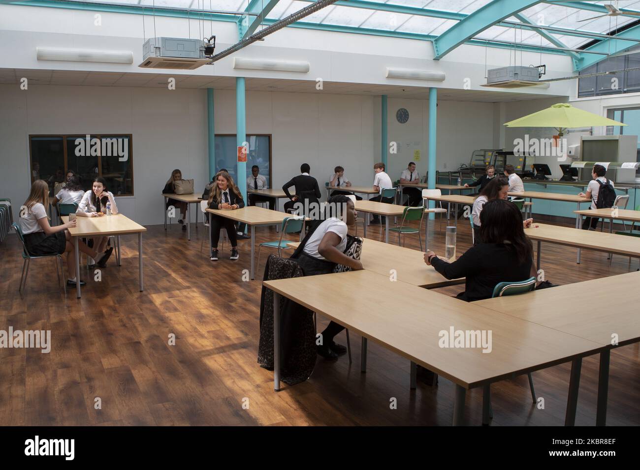 A general view of Year 10 pupils taking their break in the canteen ...
