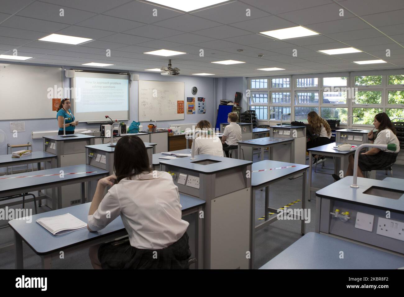 A view of a teacher teaching a class of Year 10 pupils. Ortu Gable Hall ...