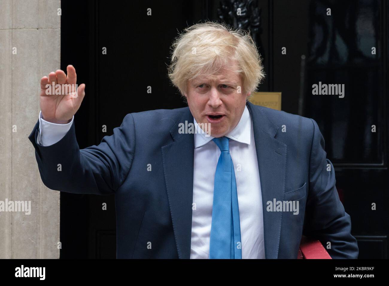 British Prime Minister Boris Johnson leaves 10 Downing Street for PMQs ...