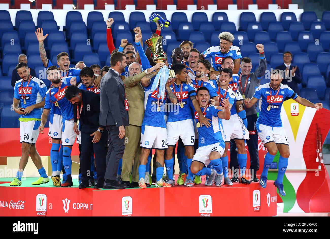 Napoli players celebrate with the trophy at the end of the Coca Cola ...