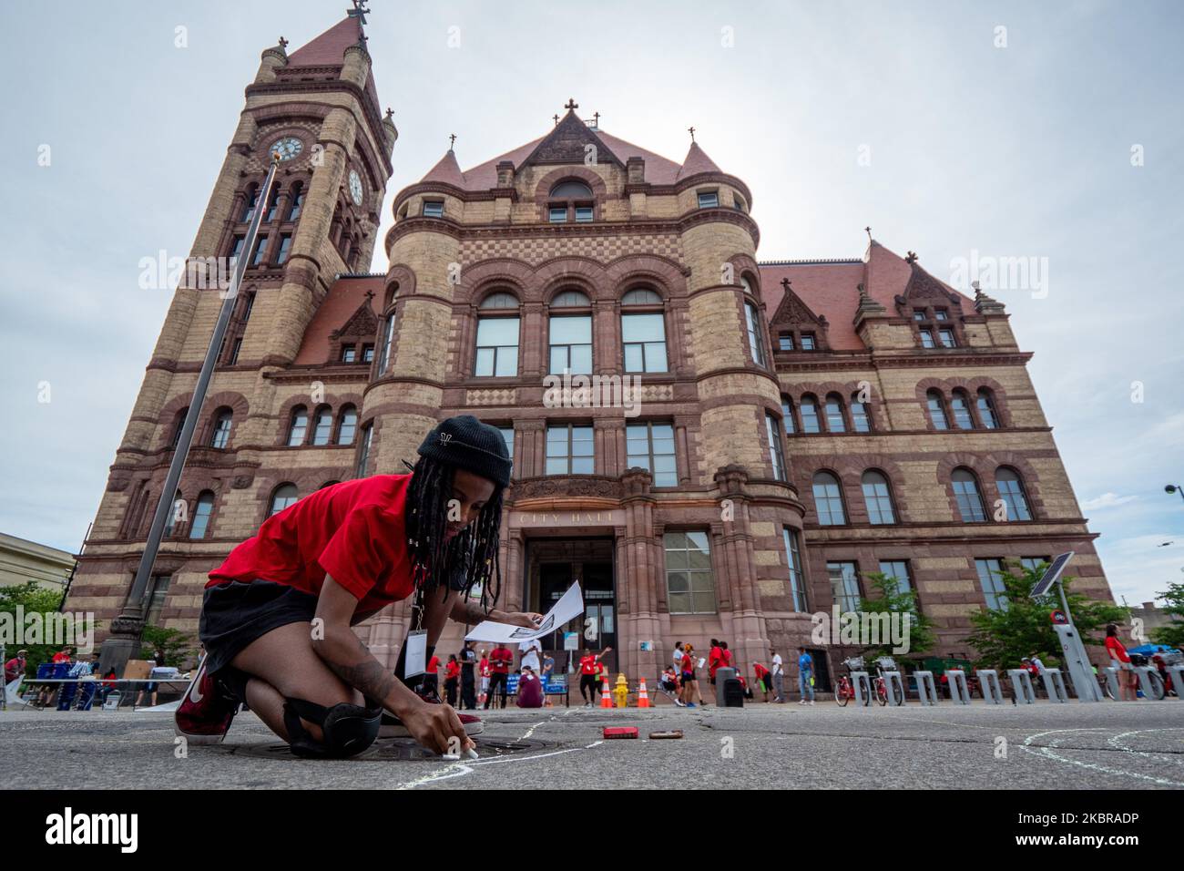 Lisa Youngblood begins to draw an outline with chalk as seventeen ...