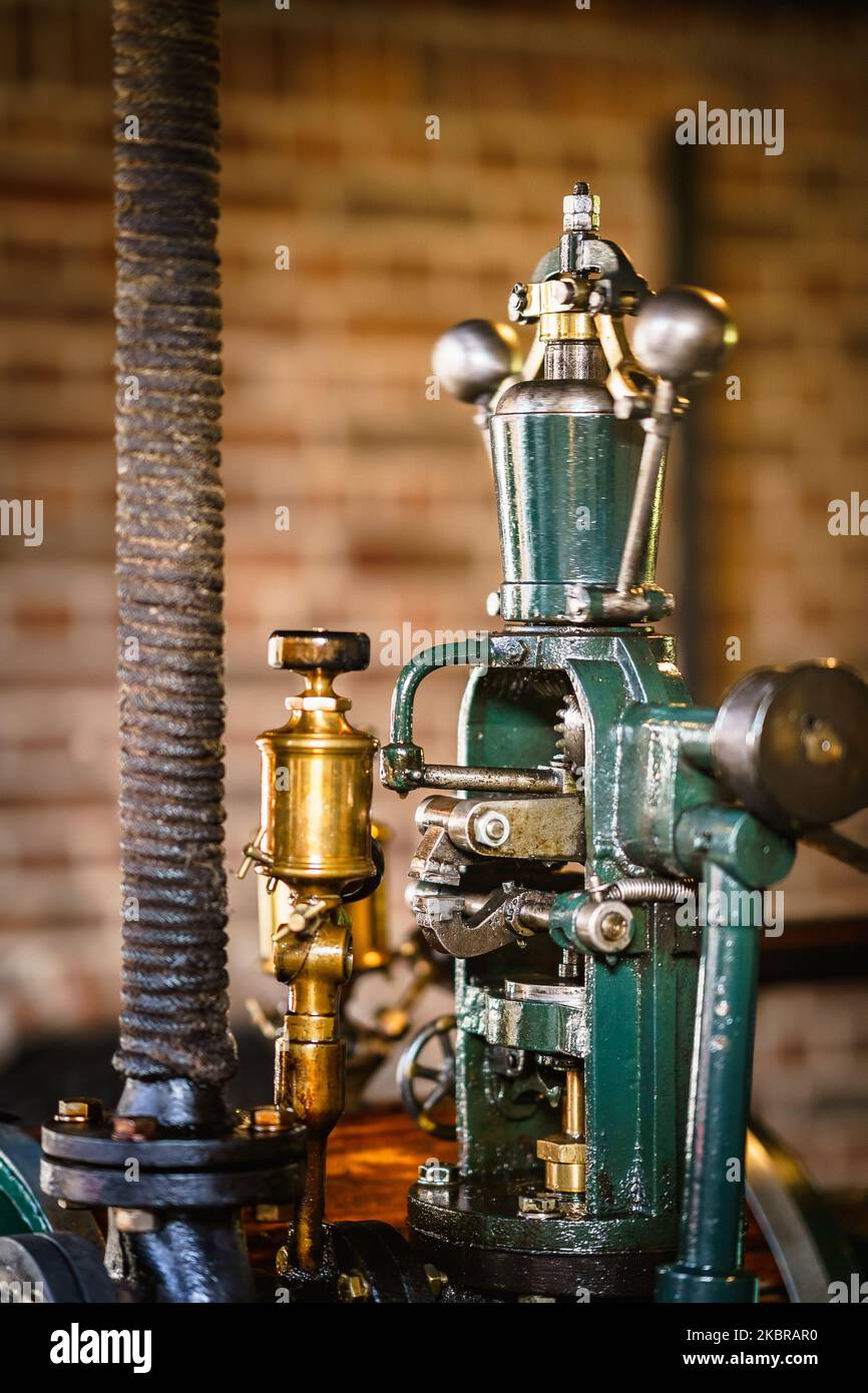 Vintage steam engine with boiler, old pipes and control valves for ...