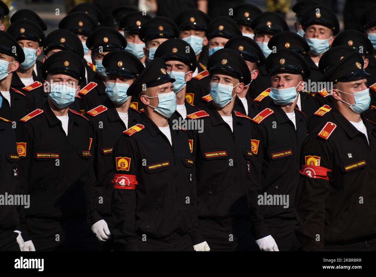 Servicemen march in formation during a rehearsal of the Victory Day ...