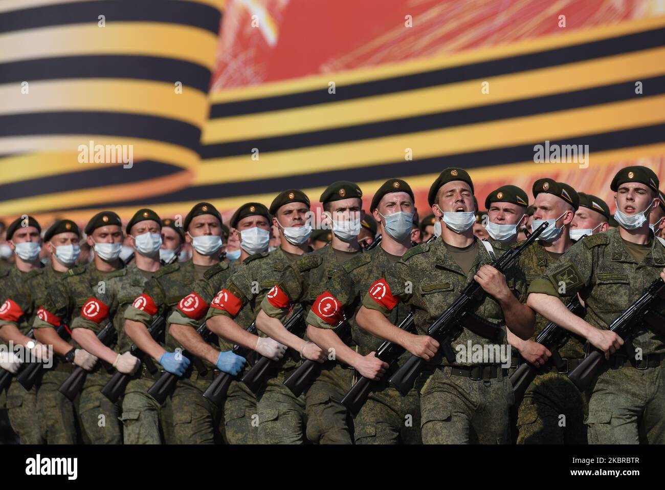 Servicemen march in formation during a rehearsal of the Victory Day ...
