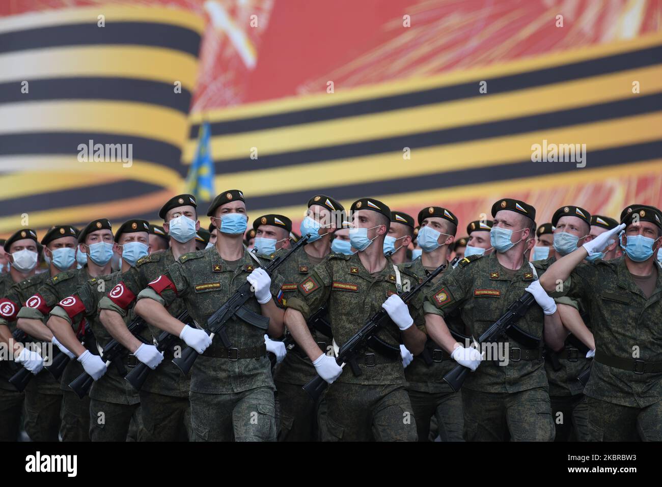 Servicemen march in formation during a rehearsal of the Victory Day ...