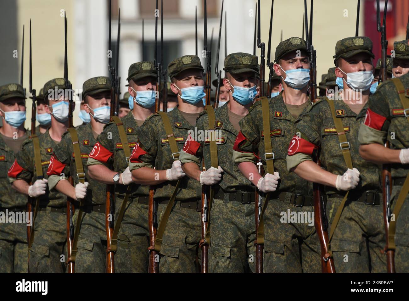 Servicemen march in formation during a rehearsal of the Victory Day ...