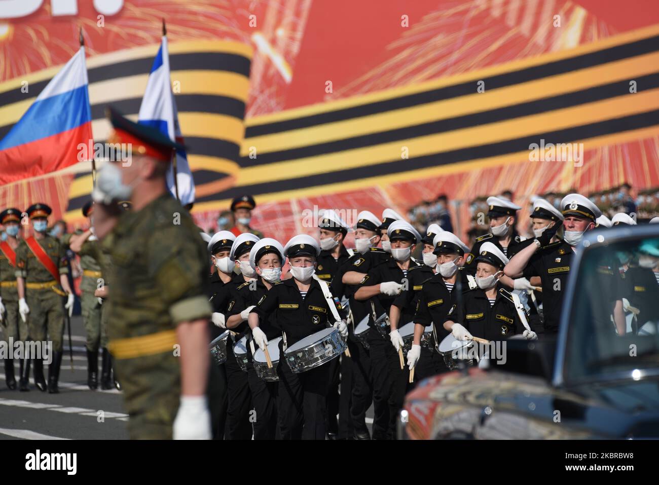 Servicemen march in formation during a rehearsal of the Victory Day ...