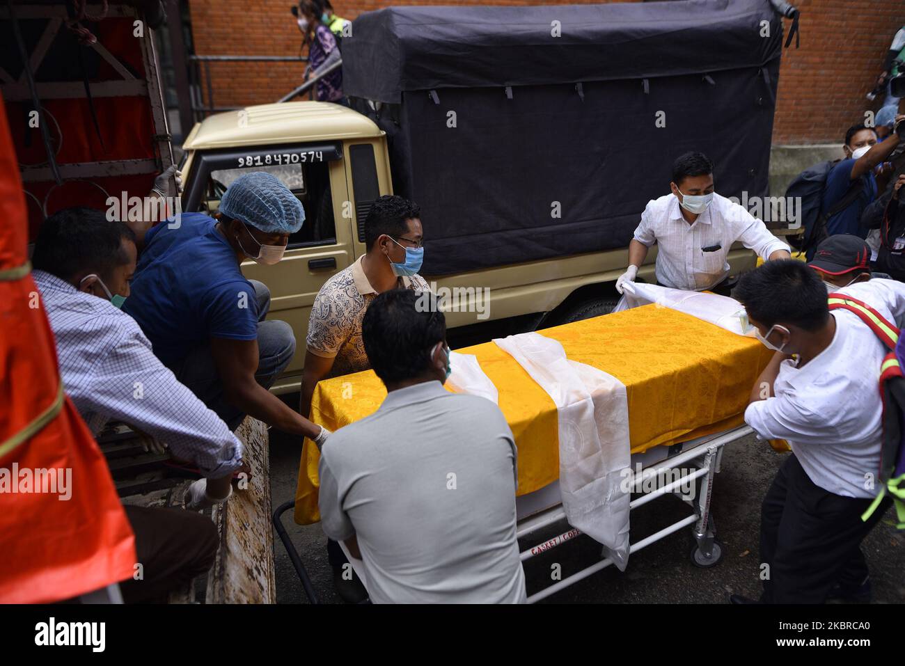 Family members and relatives carrying dead bodies of a Nepalese migrant ...