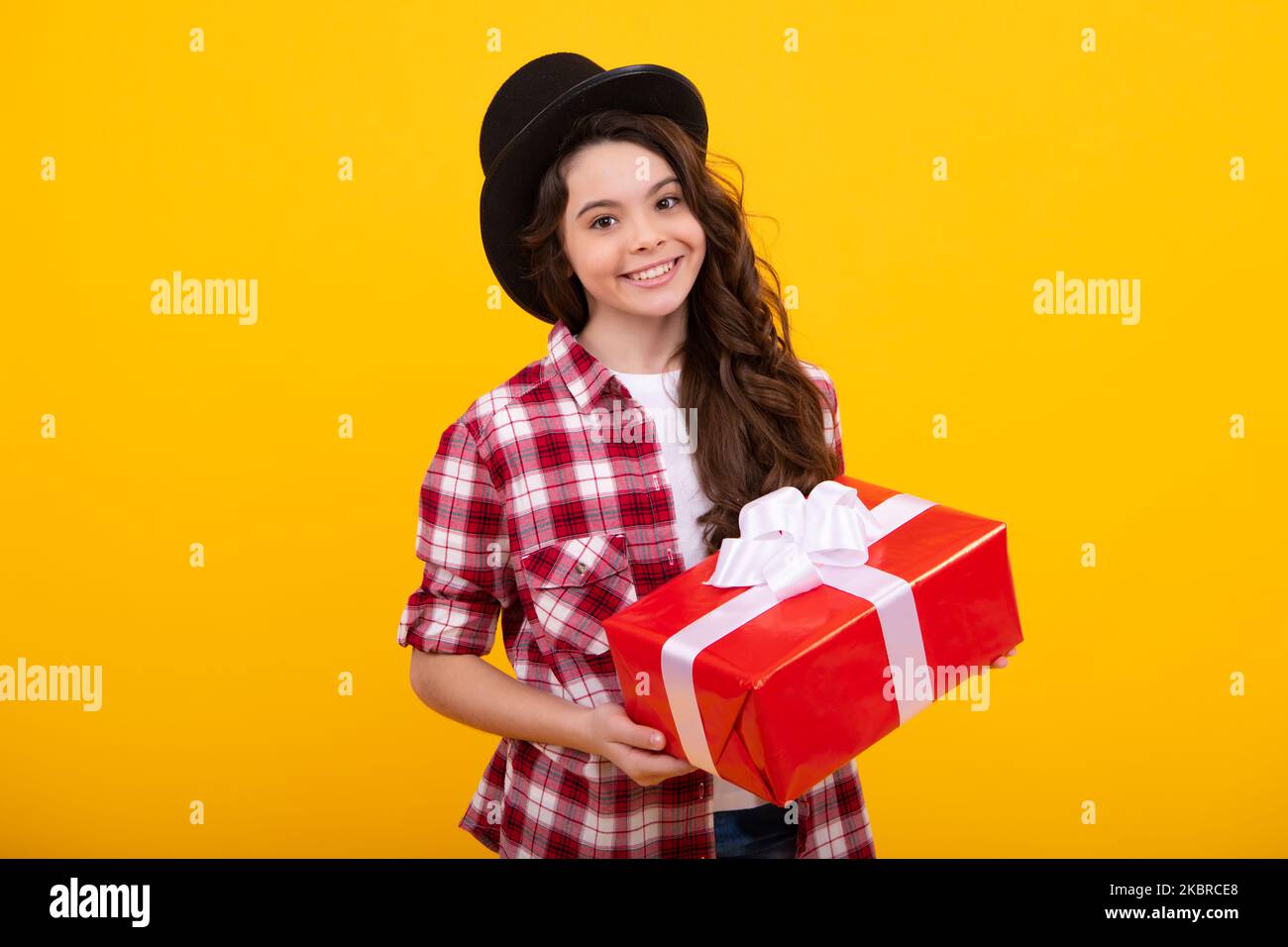 Teenager kid with present box. Teen girl giving birthday gift. Present ...