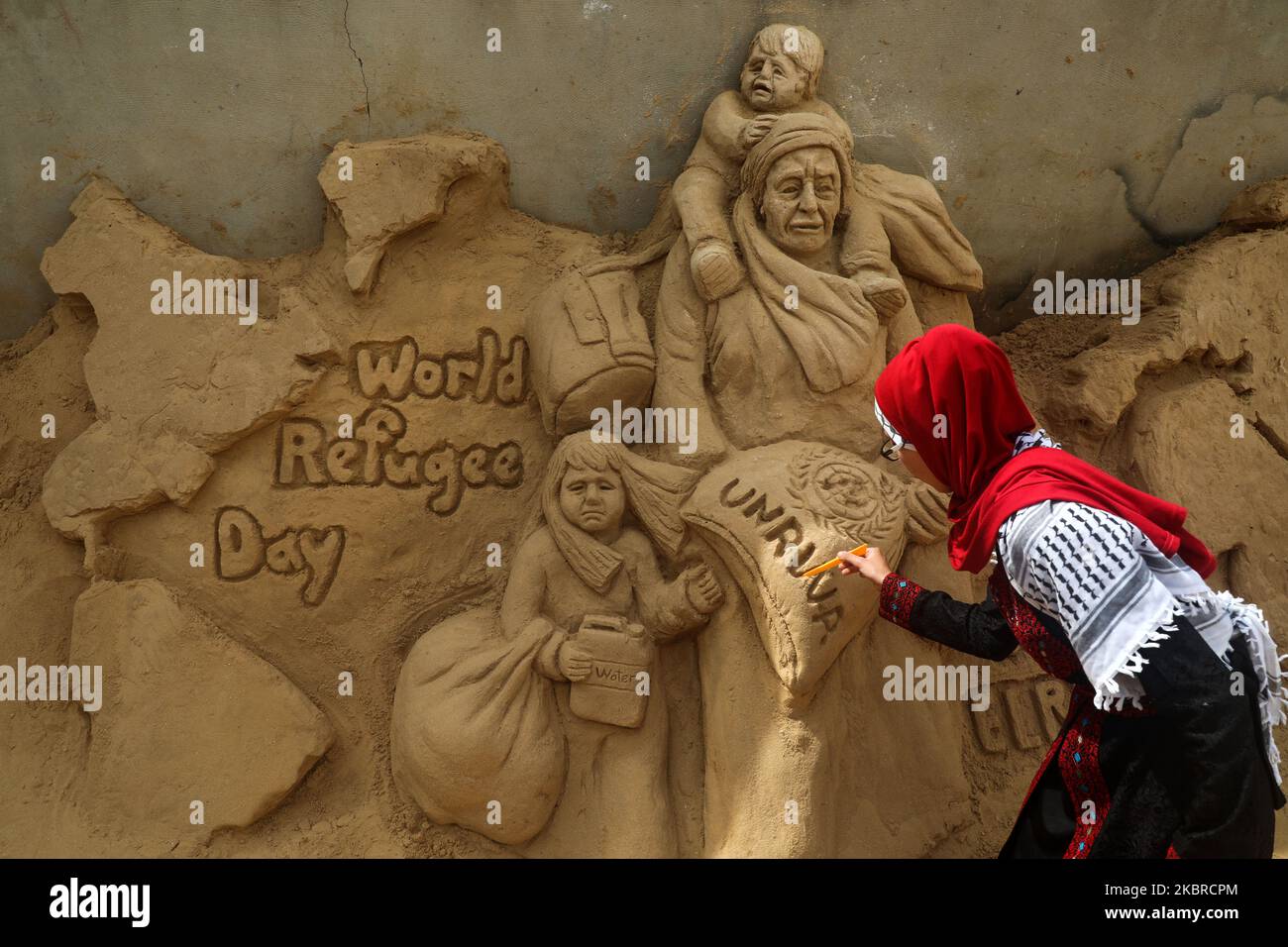 Palestinian sand sculptor Rana Ramlawi finishes a new artwork creation ...