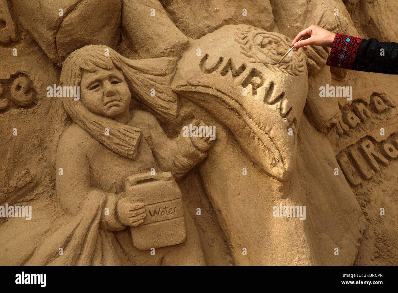 Palestinian sand sculptor Rana Ramlawi finishes a new artwork creation ...