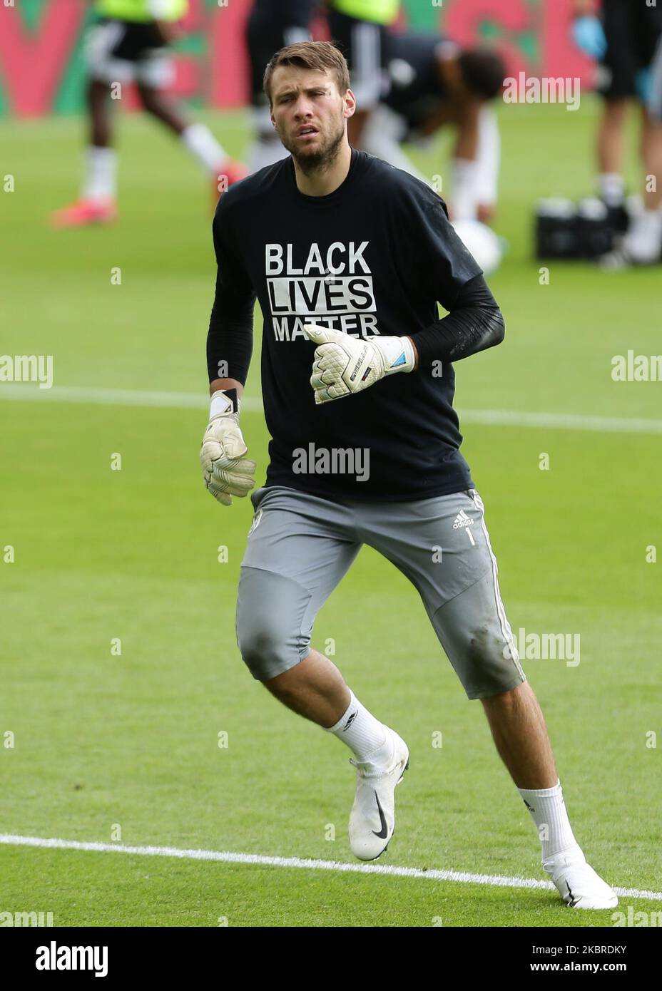 Marcus Bettinelli of Fulham wearing a black lives matter shirt during ...
