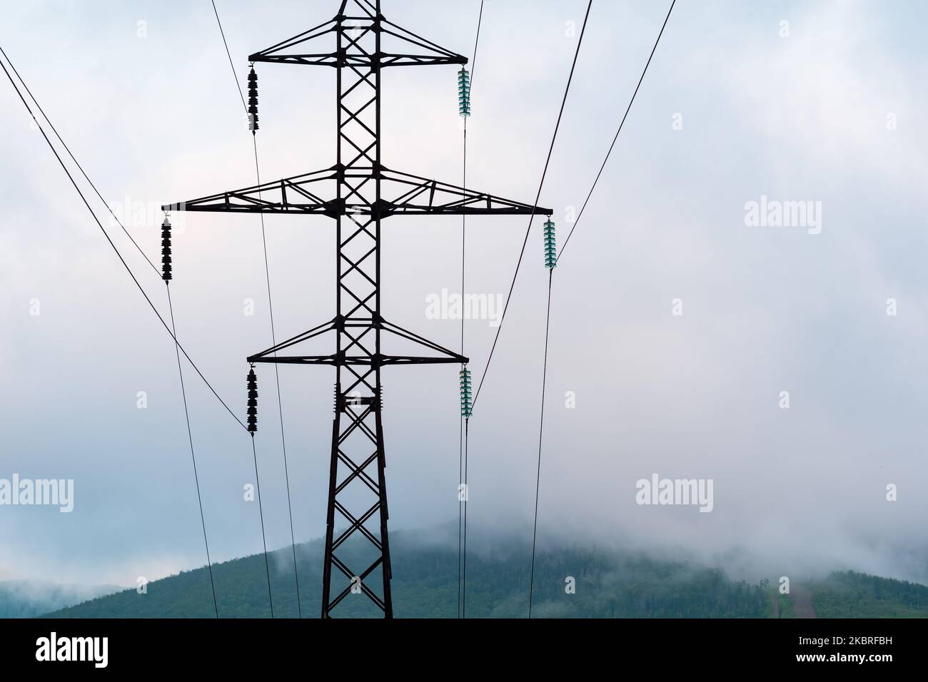 power line pylon in mountainous area Stock Photo - Alamy