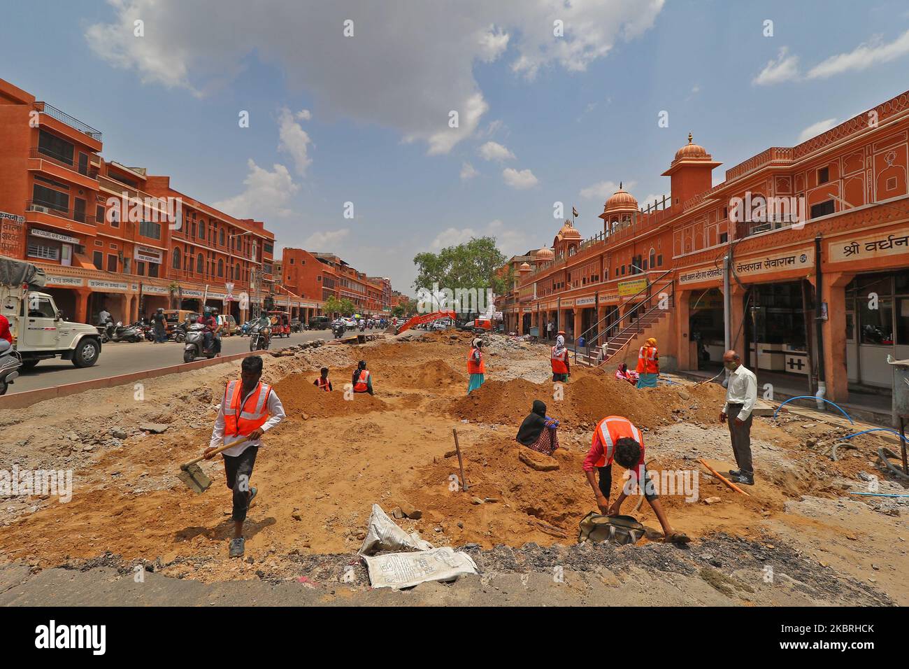 Labourers work under the Smart City Project on Chandpole Bazar road, at ...