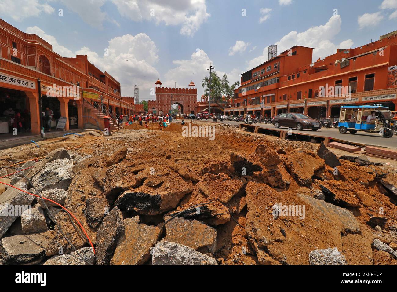 Labourers work under the Smart City Project on Chandpole Bazar road, at ...