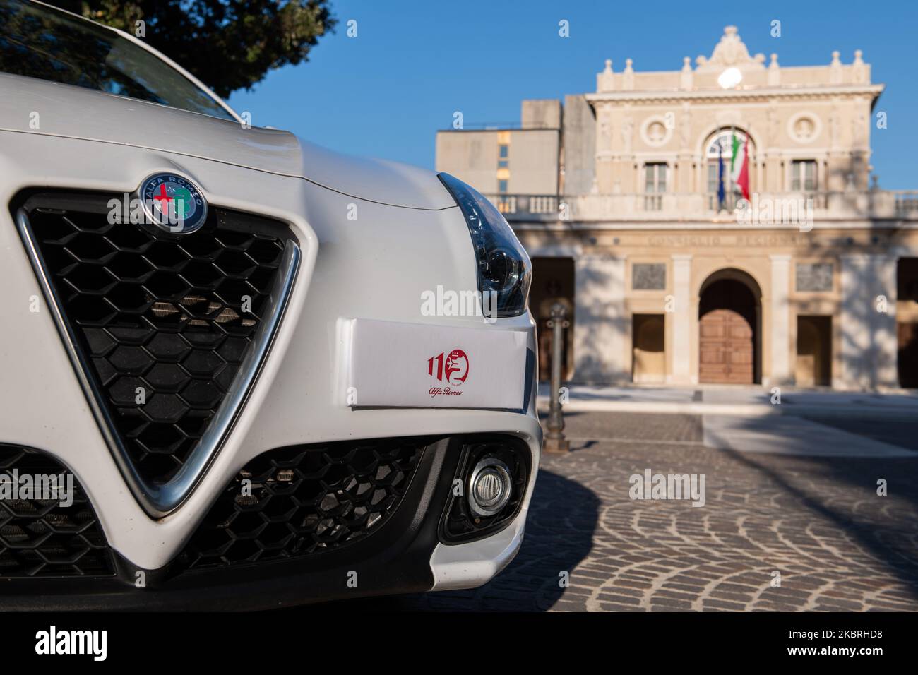An Alfa Giulietta car with a 110 years celebrative panel in L'Aquila on ...
